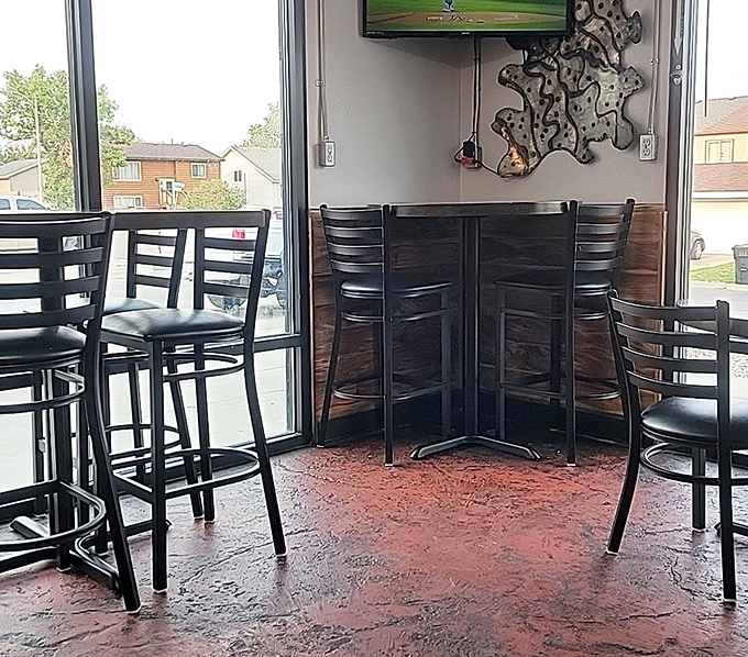 High-top seating and a view of the outside world&mdash;perfect for people-watching while you contemplate ordering seconds.
