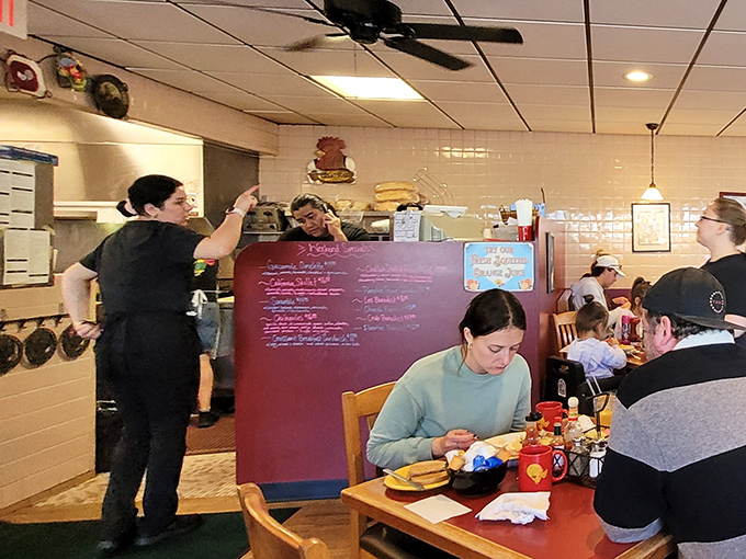 Staff in motion create the morning ballet &ndash; orchestrating eggs, coffee, and conversation with practiced precision.