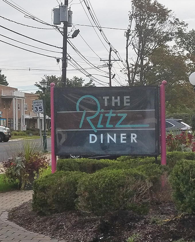 The roadside sign promises what New Jersey does best: unpretentious food served with a side of no-nonsense hospitality.