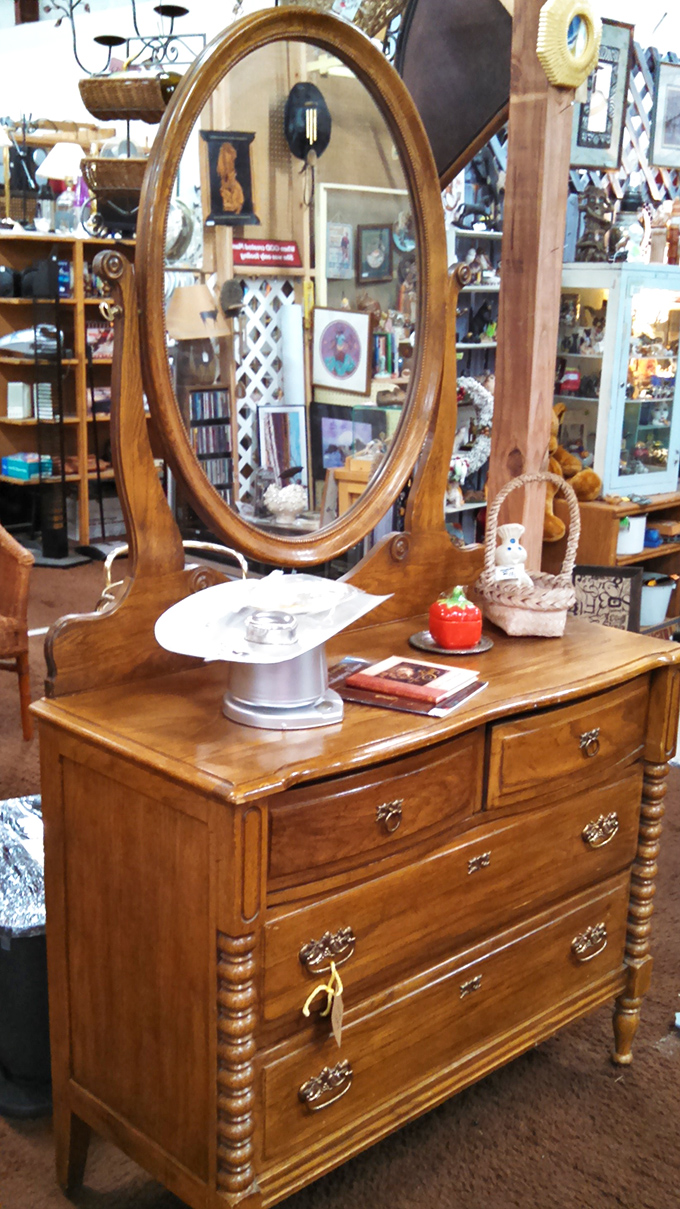 This vanity has reflected generations of faces. The craftsmanship in those spindle legs puts today's assembly-required furniture to absolute shame.