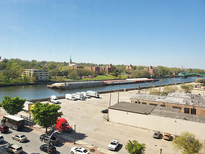 Barges navigate the waterway that helped build Joliet's economy, a reminder that this affordable city maintains its working-class roots while embracing modern amenities.