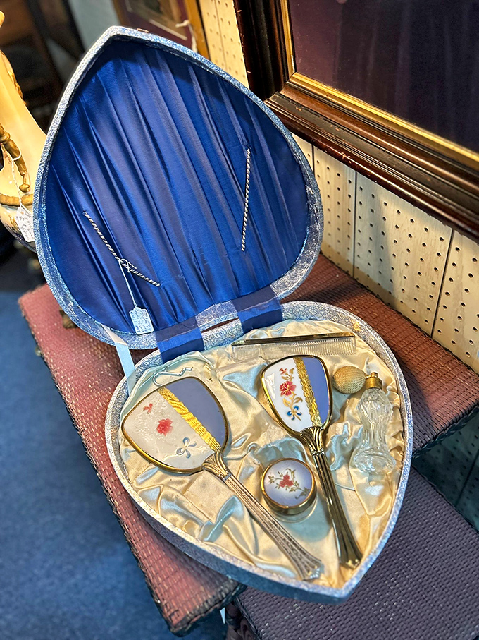 Vanity sets like this weren't just for beauty&mdash;they were daily rituals. The hand-painted brushes and mirrors transformed morning routines into moments of elegance.