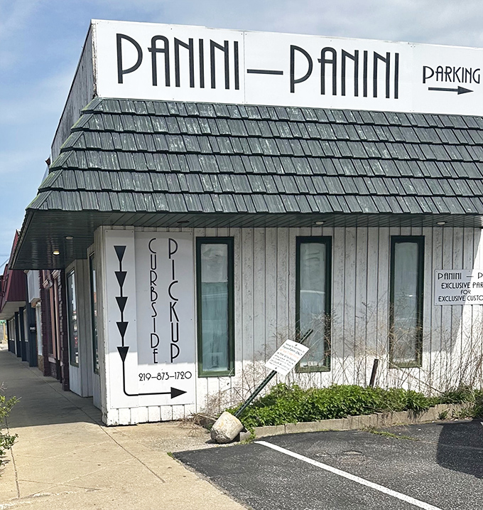 Panini Panini's distinctive white building stands like a pressed sandwich temple &ndash; simple, focused, and ready to deliver.