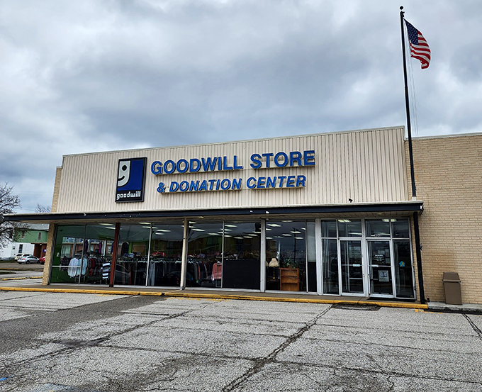 Spacious windows and an American flag frame this Goodwill location, a thrifter's paradise in Terre Haute.