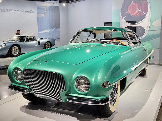 The mint-green 1954 Plymouth Explorer concept car showcases mid-century optimism with its space-age styling and chrome details that scream "The future is now!"