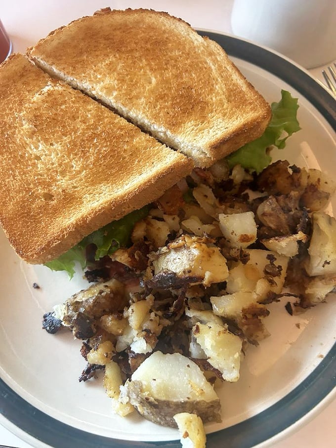 The humble BLT elevated to art form, with home fries that look like they've been individually introduced to the perfect amount of seasoning.