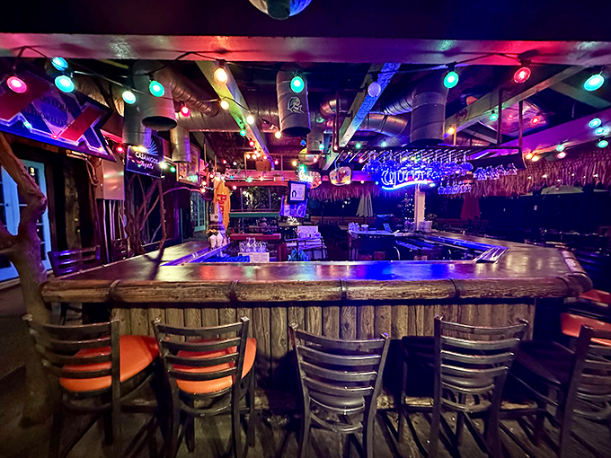 Neon lights and rustic wood create the perfect mood lighting for making bad decisions about that second round of margaritas.