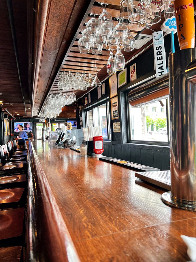 A bar polished by countless elbows and seafood stories. Wood so warm and inviting it practically asks you to stay for another round.