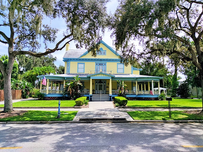 The Benjamin Franklin Holland House flaunts its vibrant yellow Victorian charm, complete with wraparound porches perfect for sweet tea sipping and people-watching.