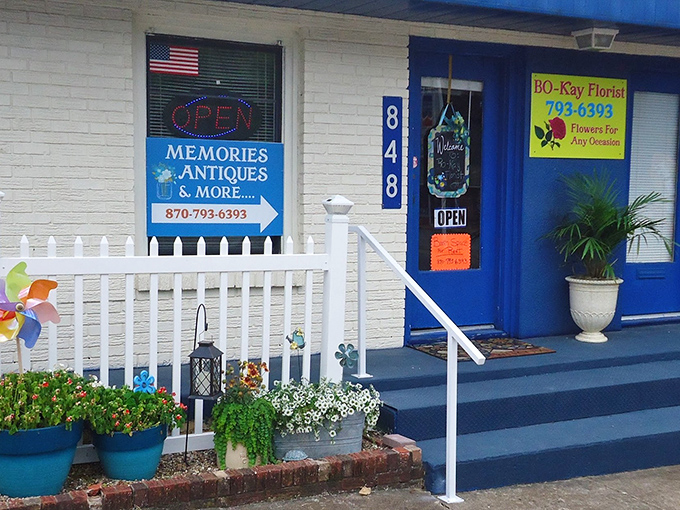 Bo-Kay Florist's cheerful blue facade and white picket fence aren't just charming&mdash;they're practically begging you to stop in for "just a quick look."