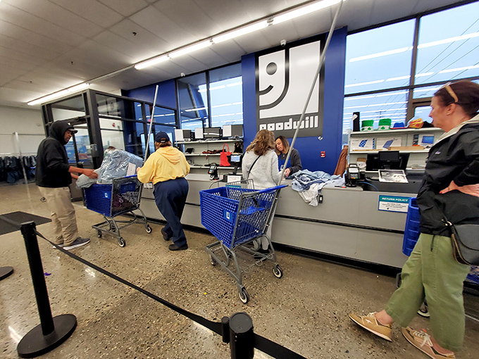 Victory lane! After successful hunting comes the satisfaction of checkout, where bargains become belongings and the thrifting cycle continues.