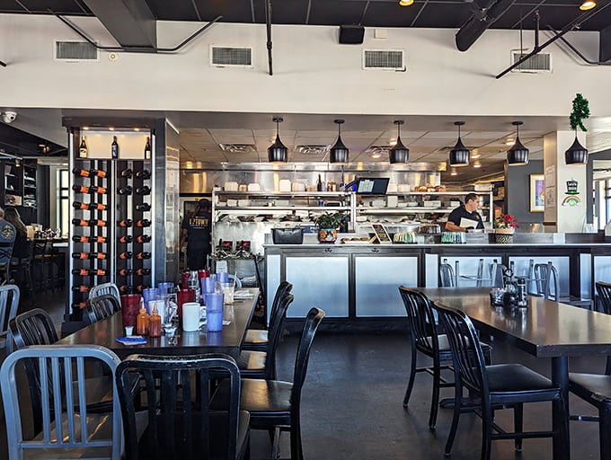 Morning light streams through windows, illuminating the pristine open kitchen where breakfast dreams come true. A front-row seat to culinary craftsmanship.