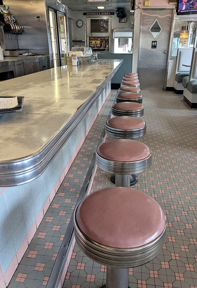 The counter &ndash; where solo diners find community, short-order cooks perform culinary ballet, and those pink stools have supported generations of hungry patrons.