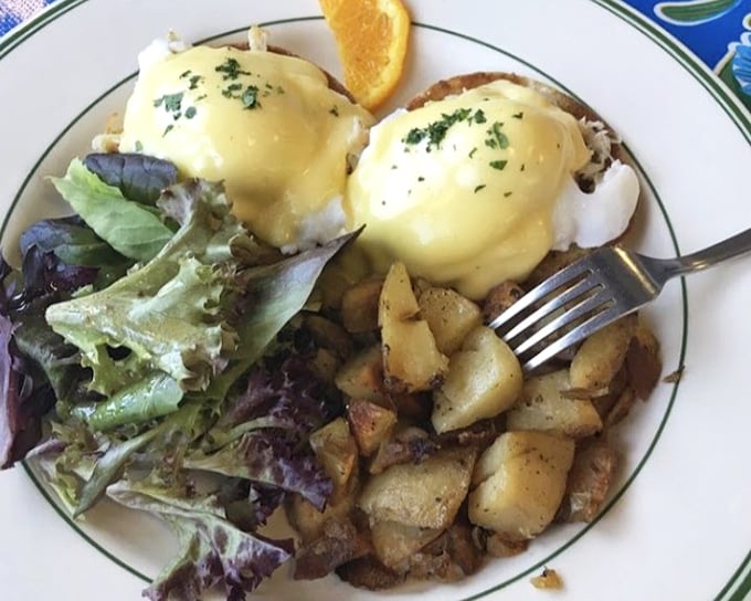 Eggs Benedict elevated to an art form. Perfectly poached eggs draped in hollandaise, with home fries that achieve the ideal crisp-to-tender ratio.