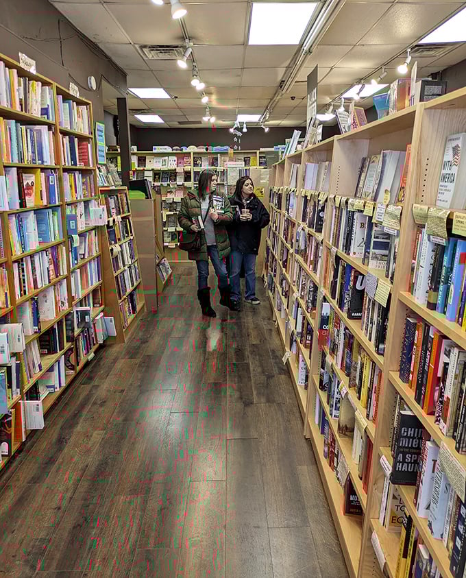 Fellow book lovers caught in their natural habitat&mdash;between shelves, deep in the hunt for their next literary obsession.