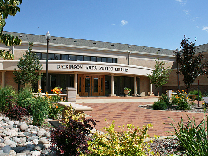 The Dickinson Area Public Library welcomes visitors with landscaped paths and the promise of adventures that don't require TSA pat-downs.