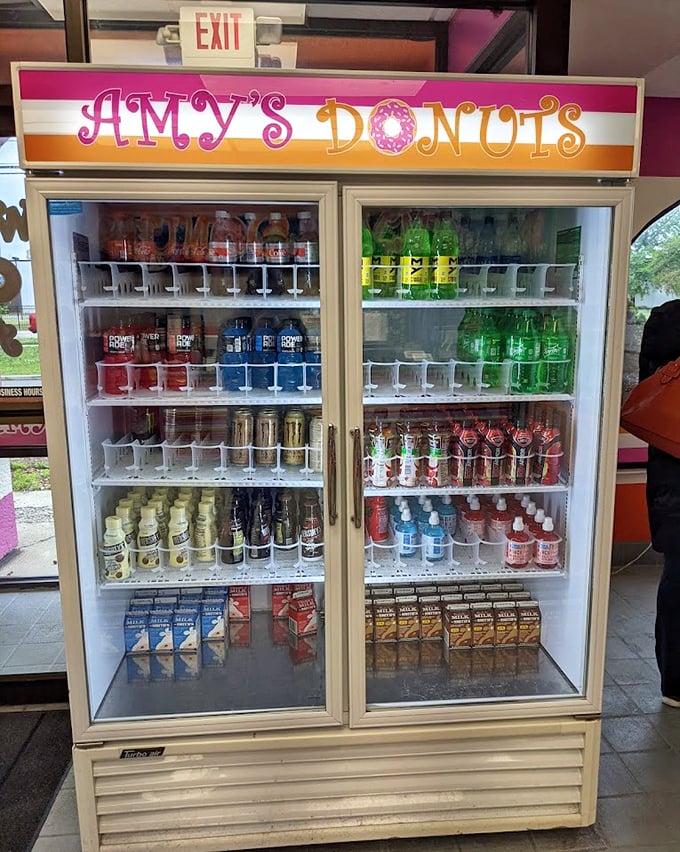 A rainbow of beverages stands ready to wash down your donut adventure. Because sometimes you need something cold to balance something sweet.