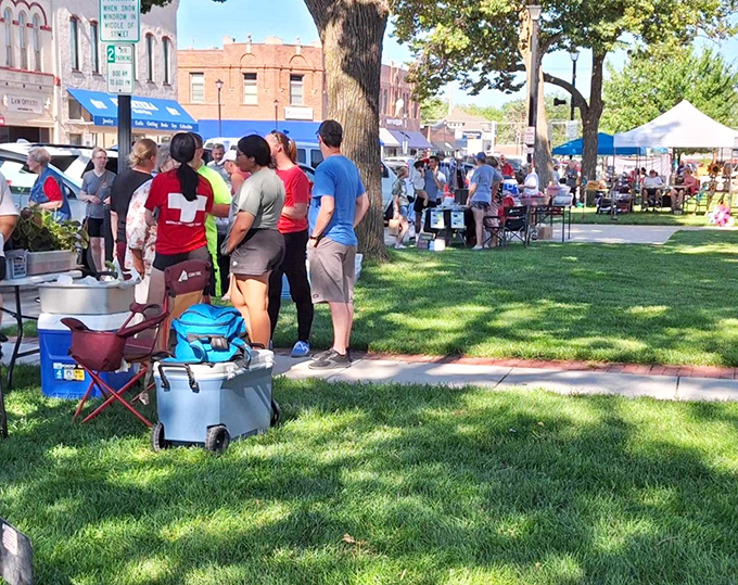 The courthouse square transforms into a vibrant community hub during market days, where locals exchange everything from produce to gossip.