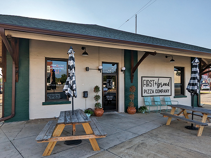 First & Broad Pizza Company's inviting patio beckons with the promise of crispy crusts and lazy afternoons where time stretches like melted cheese.