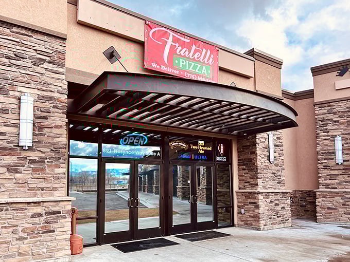 Fratelli Pizza's stone facade hints at the authentic pies waiting inside. Where desert appetites meet Italian inspiration without big-city surcharges.