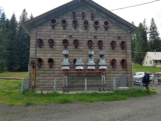 This curious building's wall of fire hose connections looks like an industrial art installation, a creative repurposing of equipment that once protected the town.