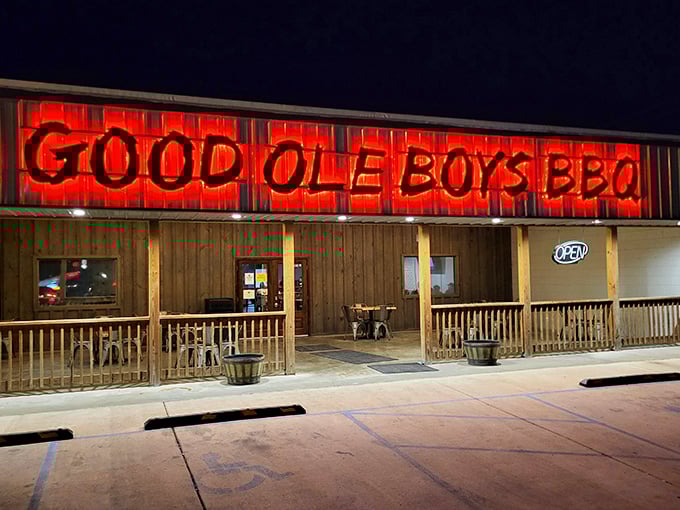 Good Ole Boys BBQ glows with neon promise, beckoning barbecue lovers to experience smoke-kissed meat prepared the way tradition intended.