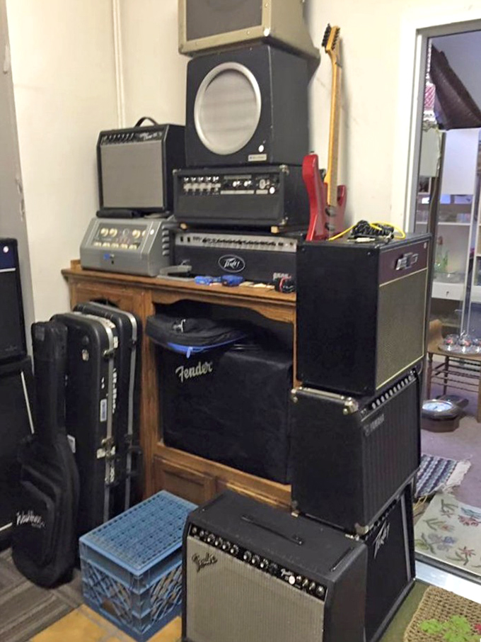 Fender amps stacked like a rock star's dream setup, minus the roadies and the tinnitus from decades of concerts.