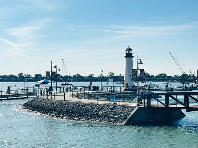Boats rest peacefully in their slips while the lighthouse stands guard. A perfect harmony of form and function.