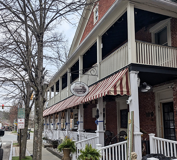 The Dimmick Inn's striped awning and welcoming porch practically whisper, "Come in, sit down, and stay awhile."