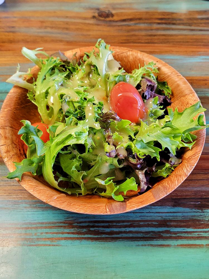 Even the house salad gets special treatment here&mdash;fresh greens and cherry tomatoes served in a wooden bowl that would make a frontier settler proud.