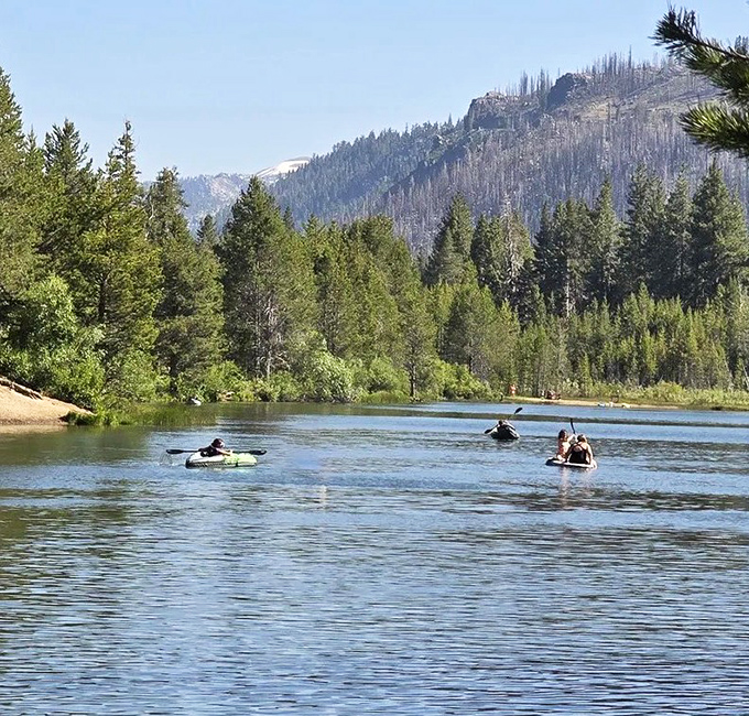 Kayakers discovering that paddling here is like gliding through a living postcard. No Instagram filter can improve on this reality.