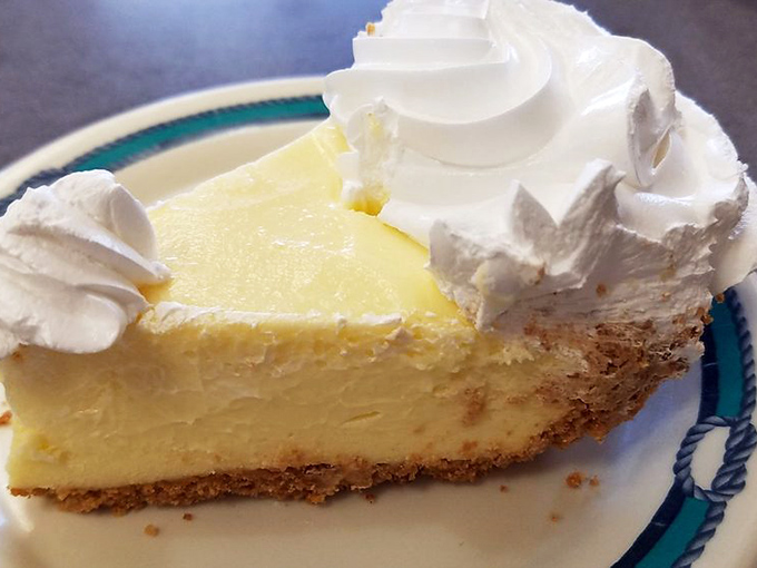 Key lime pie that strikes that perfect balance between sweet and tart, topped with clouds of whipped cream that refuse to be ignored.