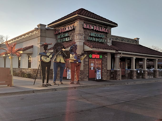 Mexican cuisine with mariachi statues standing guard, ensuring your margarita consumption happens under proper festive supervision and approval.