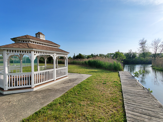 This pristine gazebo overlooking tranquil waters offers the perfect spot for contemplating life's big questions or simply enjoying a good book.