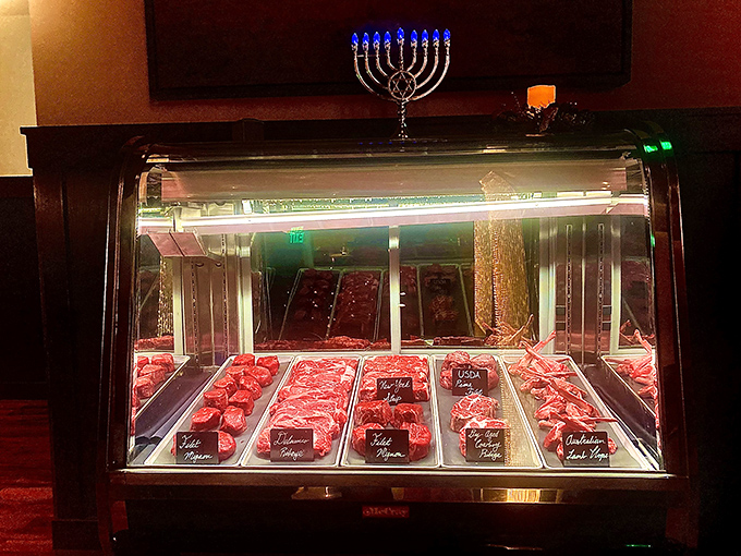 The meat display case&mdash;where dreams begin and diets end&mdash;showcasing cuts that would make a vegetarian reconsider life choices.