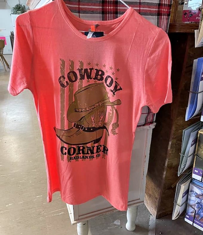 The ultimate souvenir: a Cowboy Corner t-shirt, because sometimes you need proof that you discovered culinary gold in the middle of nowhere.