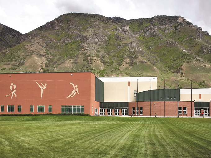 The Peaks Ice Arena stands ready for winter warriors against a backdrop of summer mountains – Utah's perfect seasonal paradox.