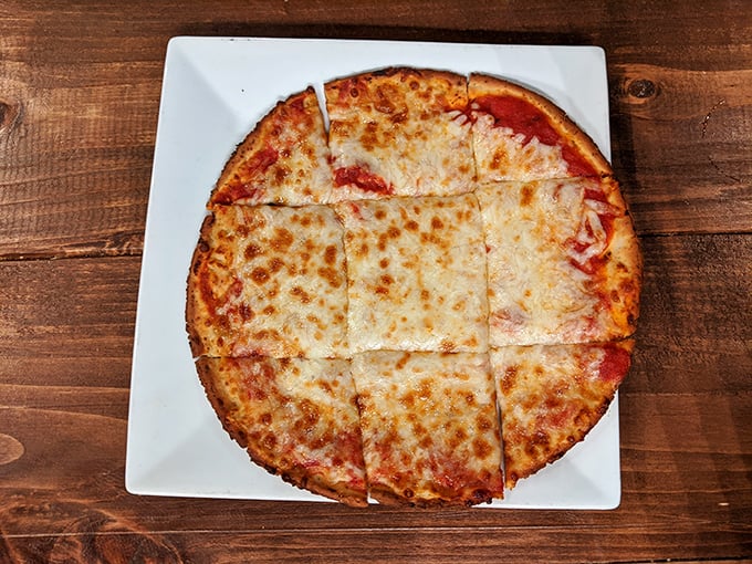 This pizza's perfect cheese-pull potential could win Olympic medals if stretchy dairy were a competitive sport.