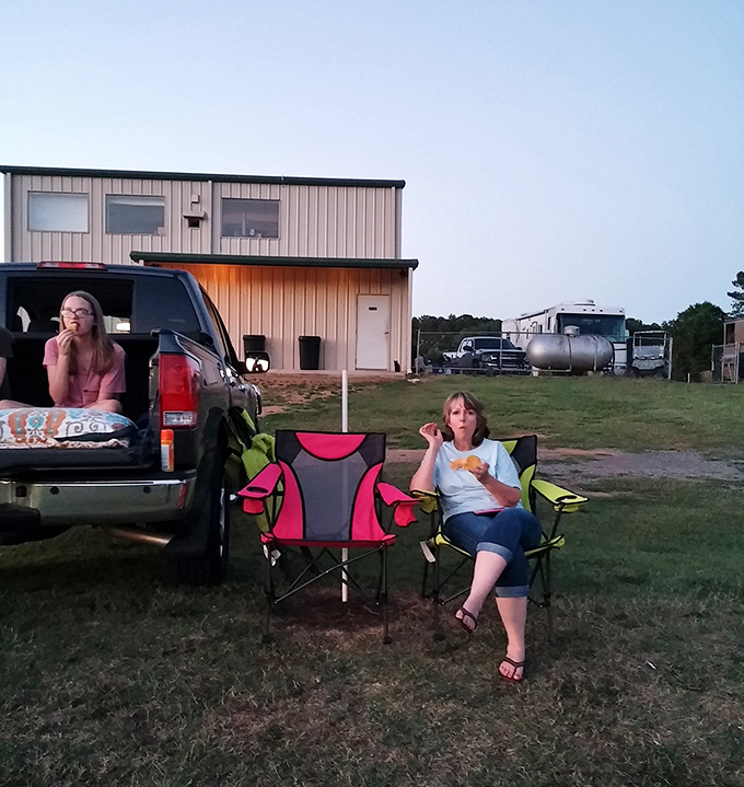 Tailgating reimagined: folding chairs, pickup trucks, and the patient wait for showtime. Some traditions just get better with age.