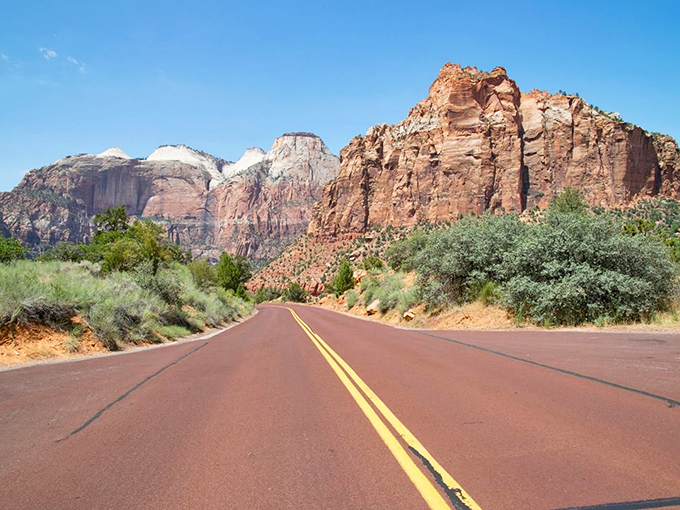 The road less traveled, if the road less traveled were actually world-famous. Those yellow lines guide you through a geological wonderland.