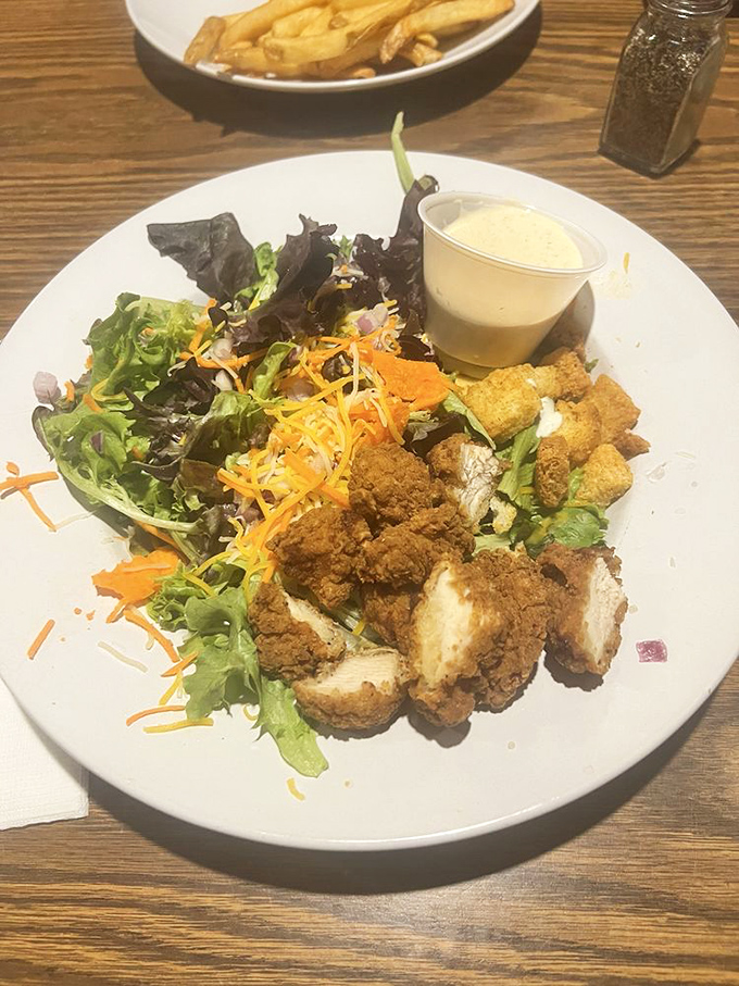 A salad that doesn't feel like punishment. Crispy chicken and fresh greens prove that sometimes, vegetables are more than just a moral obligation.