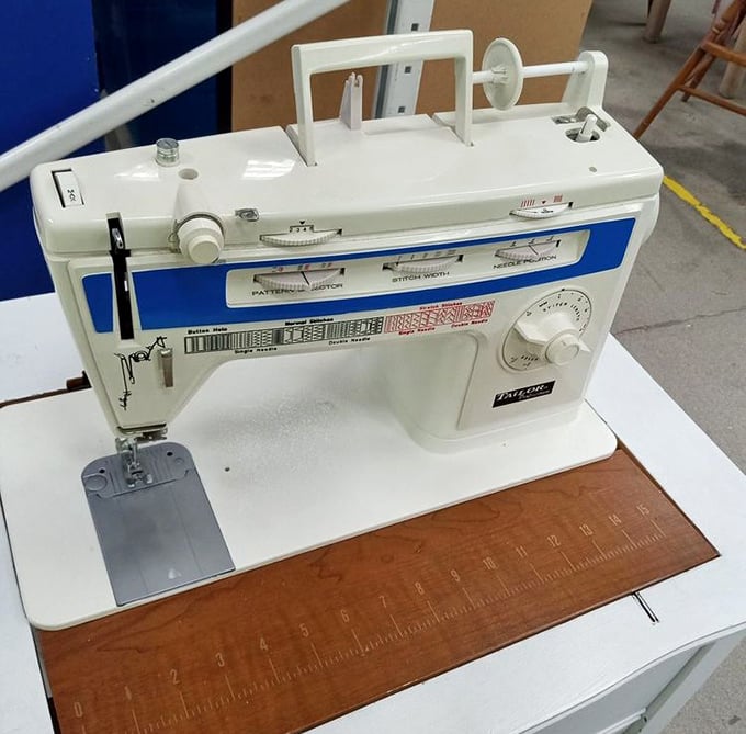 A sewing machine that's seen more fashion trends than Tim Gunn. This mechanical marvel awaits someone with Pinterest dreams and YouTube tutorial courage.