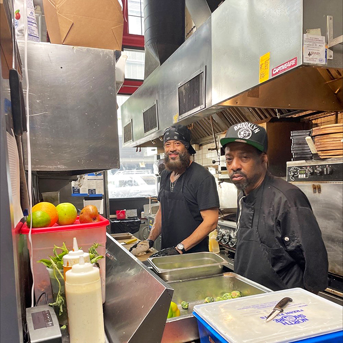 The bar gleams with amber bottles backlit like trophies – a wall of possibilities for whatever kind of day you're celebrating or escaping.