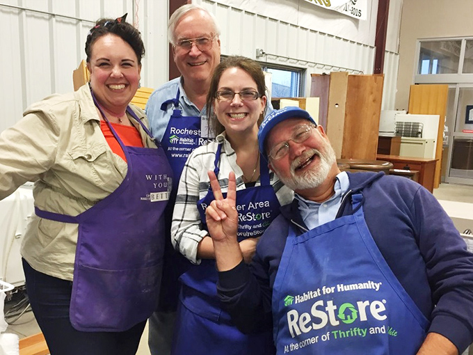 The smiling faces behind ReStore's mission&mdash;volunteers who turn your donations into community housing one cheerful transaction at a time.