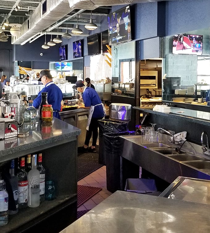 Where the magic happens&mdash;the open kitchen offers a glimpse of culinary choreography. Skilled hands transform ocean treasures into memorable meals.