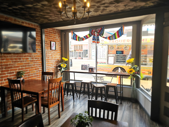 Exposed brick and natural light create an inviting atmosphere at this local eatery. Where conversations matter as much as what's on your plate.