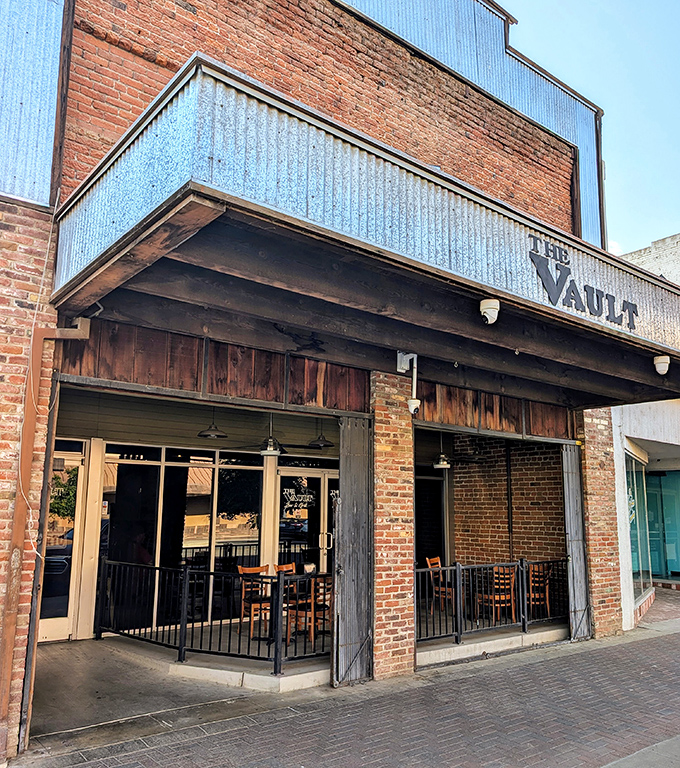 The Vault's rustic brick exterior and patio seating invite diners to enjoy California cuisine in what was once a literal bank vault.