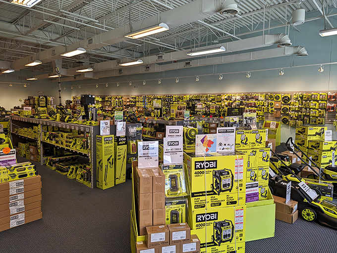 The Ryobi section—where weekend warriors and serious DIYers alike find their weapons of mass construction at prices that won't demolish savings.