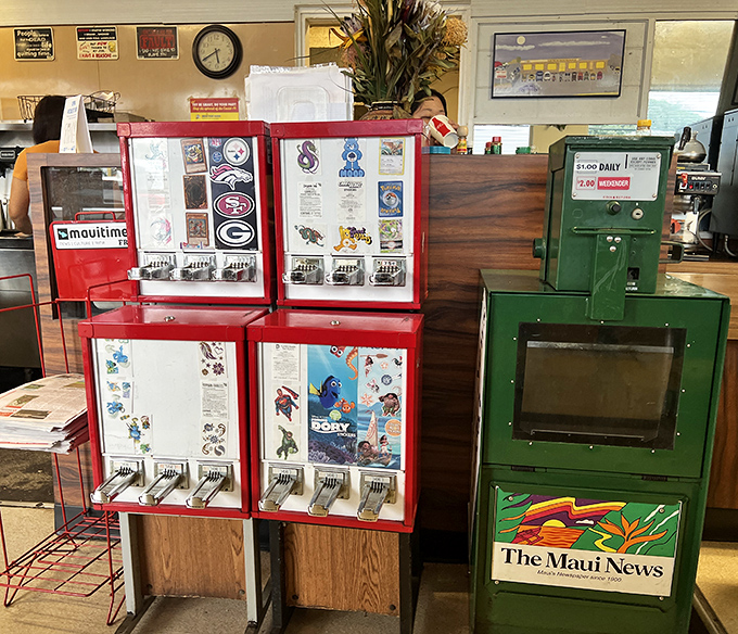 Newspaper stands and vending machines—relics of a pre-digital age that somehow feel right at home in this timeless establishment.