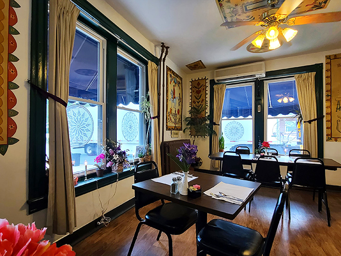 Windows that let in light but keep the modern world at bay. This dining room feels like stepping into a simpler, more delicious era.